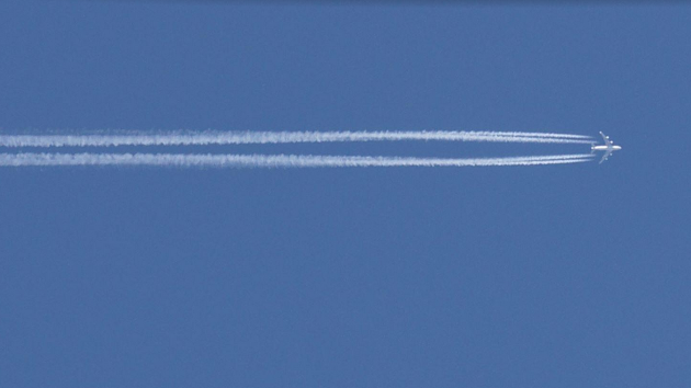 Soot in aircraft exhaust and the climate impact of air traffic