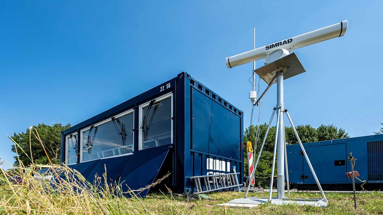 Remote-controlled sailing through a dock with ‘Josephine’