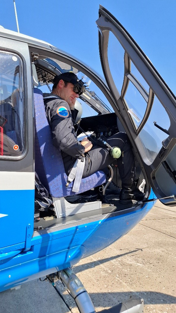 Pilot with Helmet Mounted Display for displaying symbols to evaluate handling qualities during ...