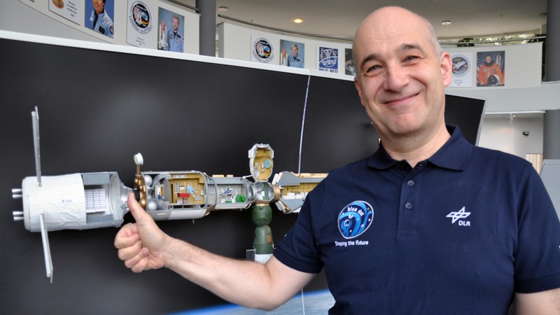DLR ATV Programme Manager Volker Schmid in front of a model of the ...