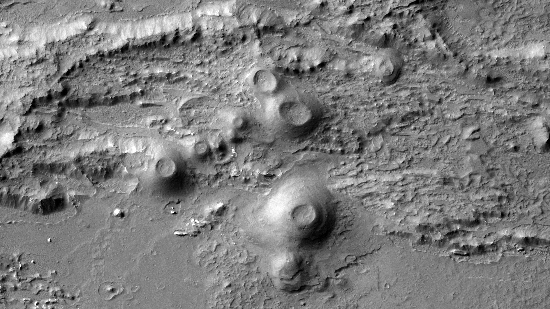 Young volcanoes at the base of Coprates Chasma on Mars